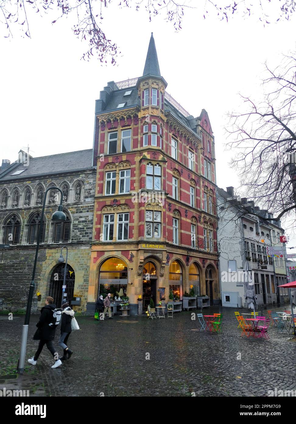 Grashaus entrance gate with old archway and inscription under the ledge ...