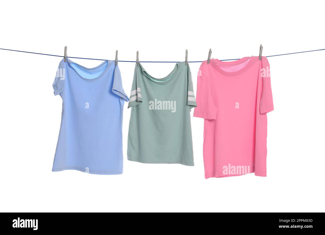 Different clothes drying on washing line against white background Stock ...