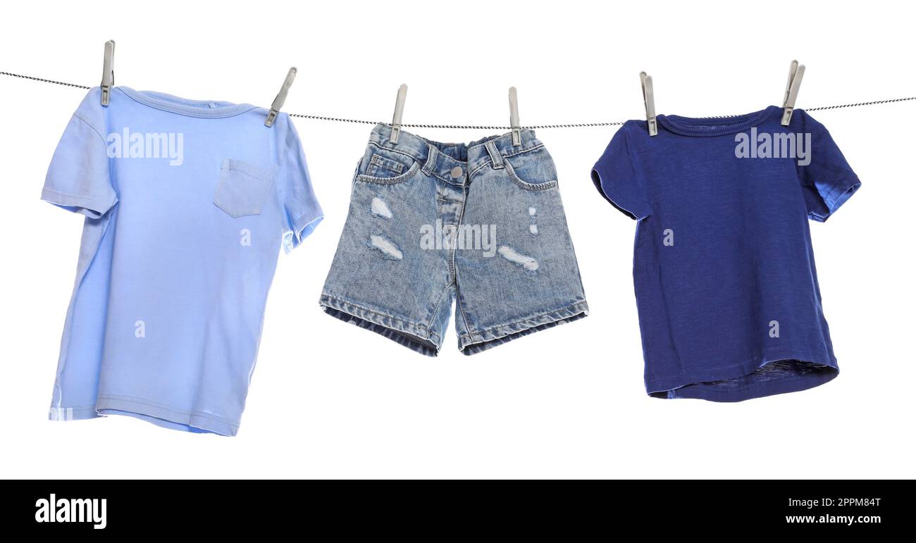 Different clothes drying on washing line against white background Stock ...