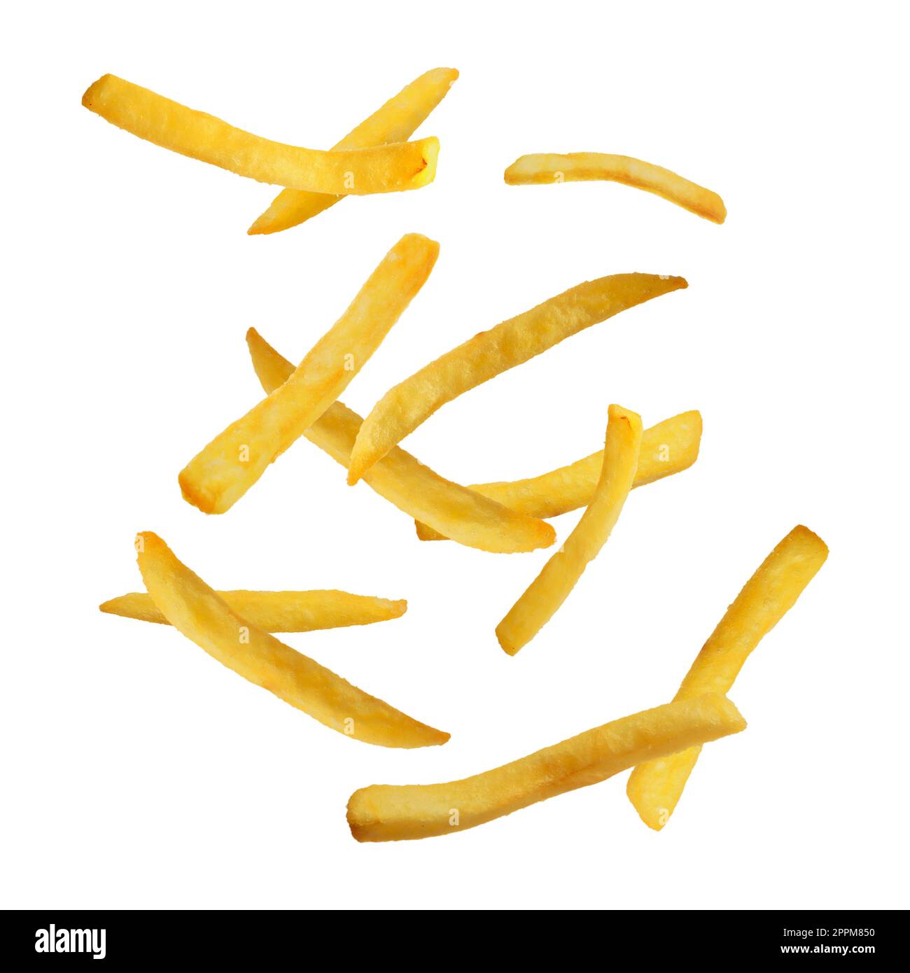 Tasty french fries falling on white background Stock Photo - Alamy