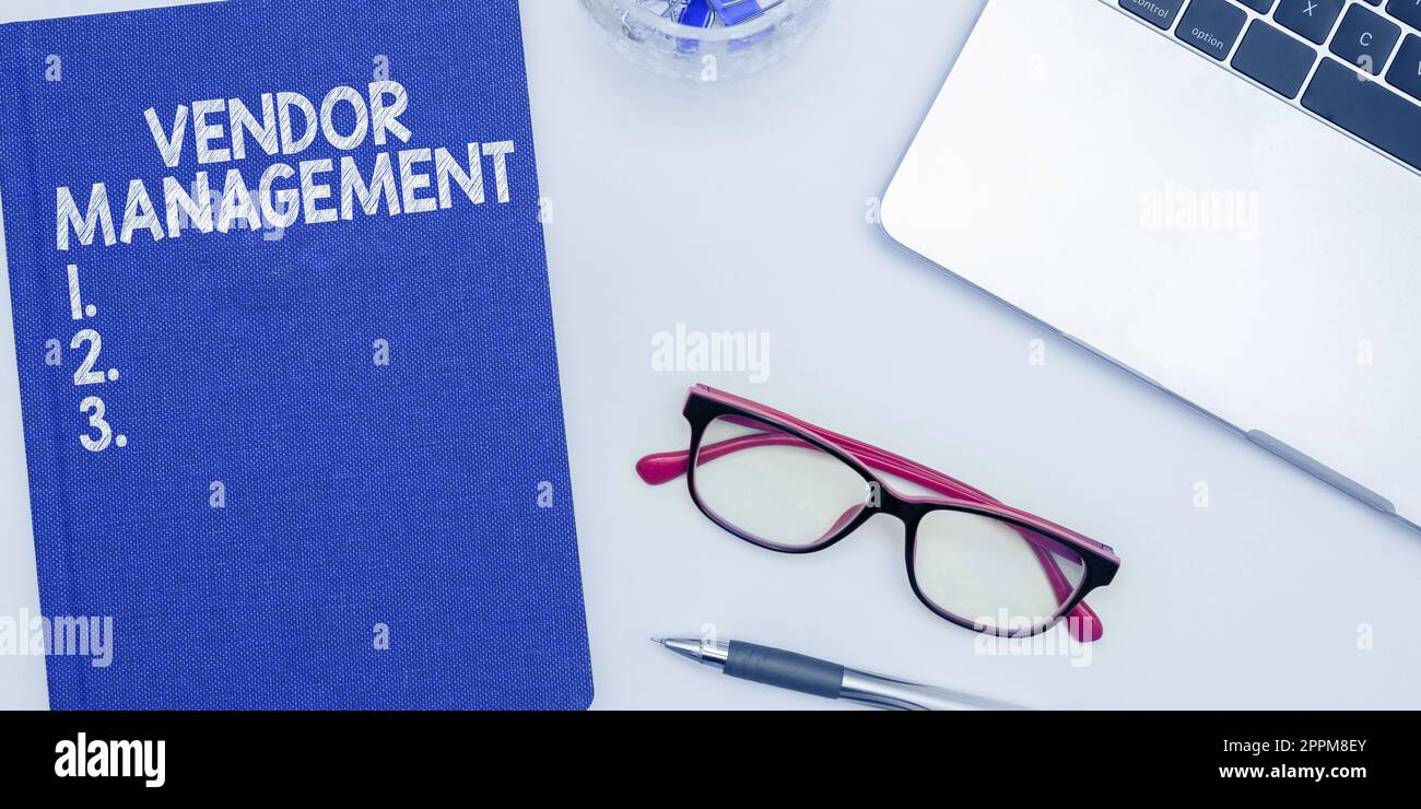 Sign displaying Vendor Management. Business overview activities ...