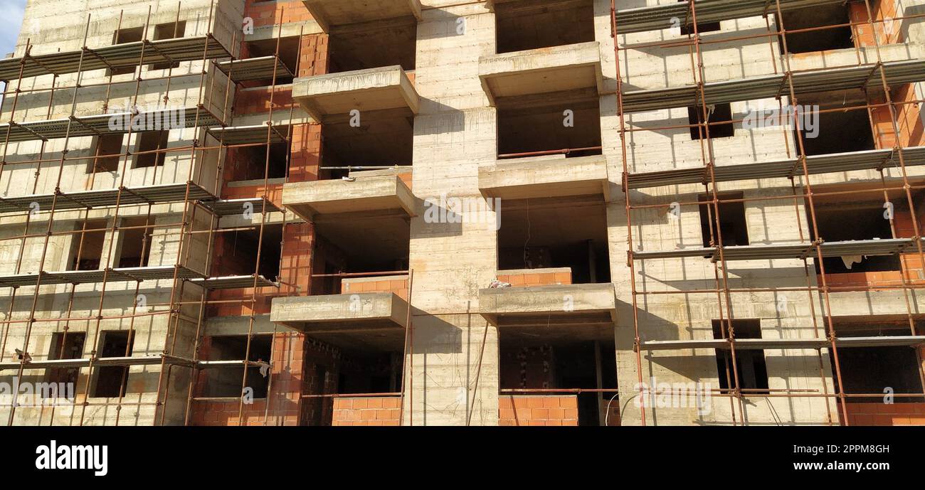 Construction site with new building of a residential quarter hi-res ...