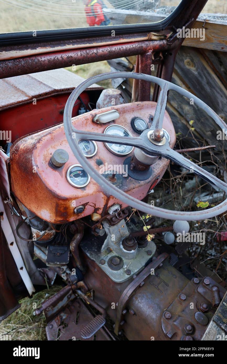 Steering wheel and instruments on an old tractor Stock Photo - Alamy