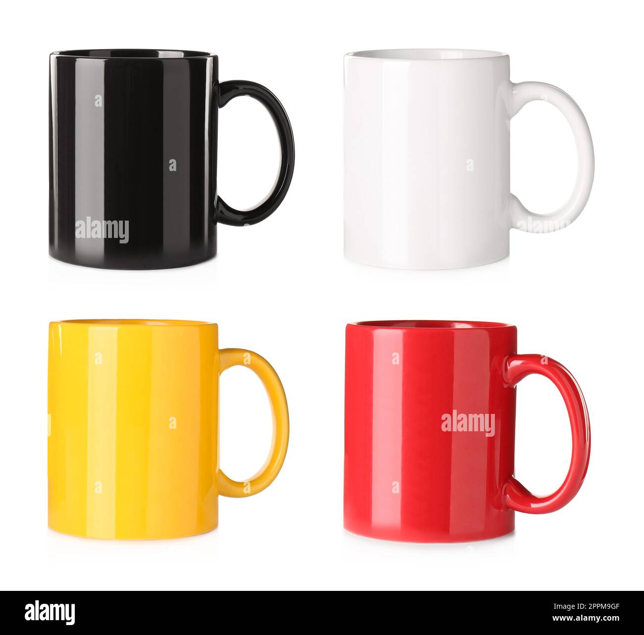 Set with different ceramic mugs on white background Stock Photo - Alamy