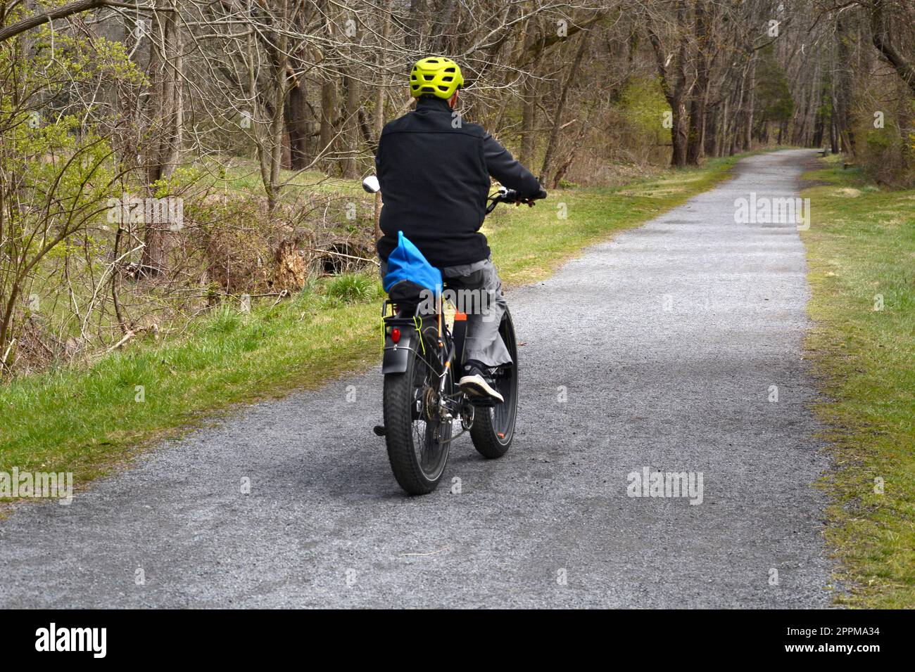 A cyclist rides his bike along the Virginia Creeper Trail, a multi ...