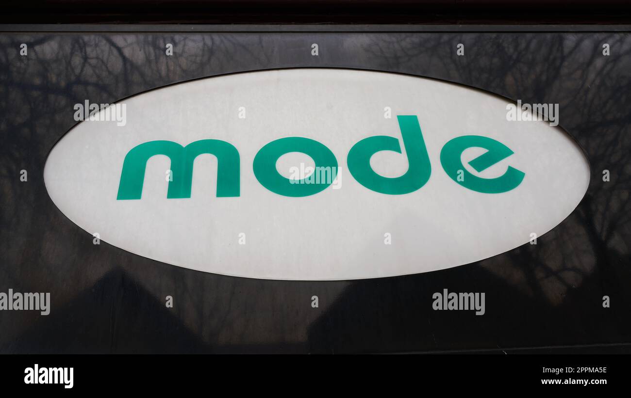 Neon sign with german lettering mode on a german fashion store ...