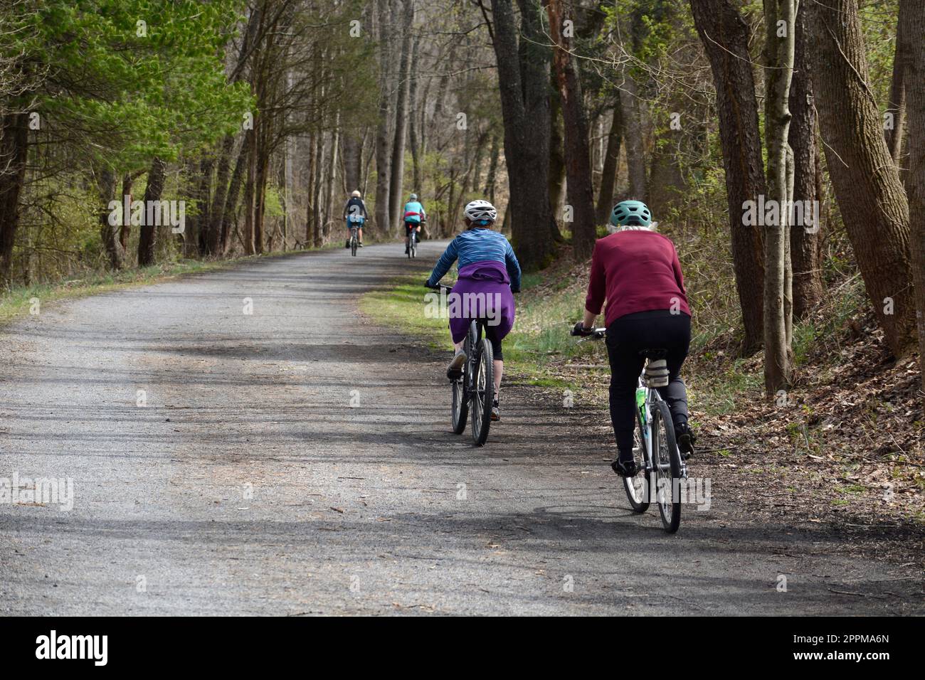 Bicyclists and walkers enjoy the Virginia Creeper Trail, a multi ...