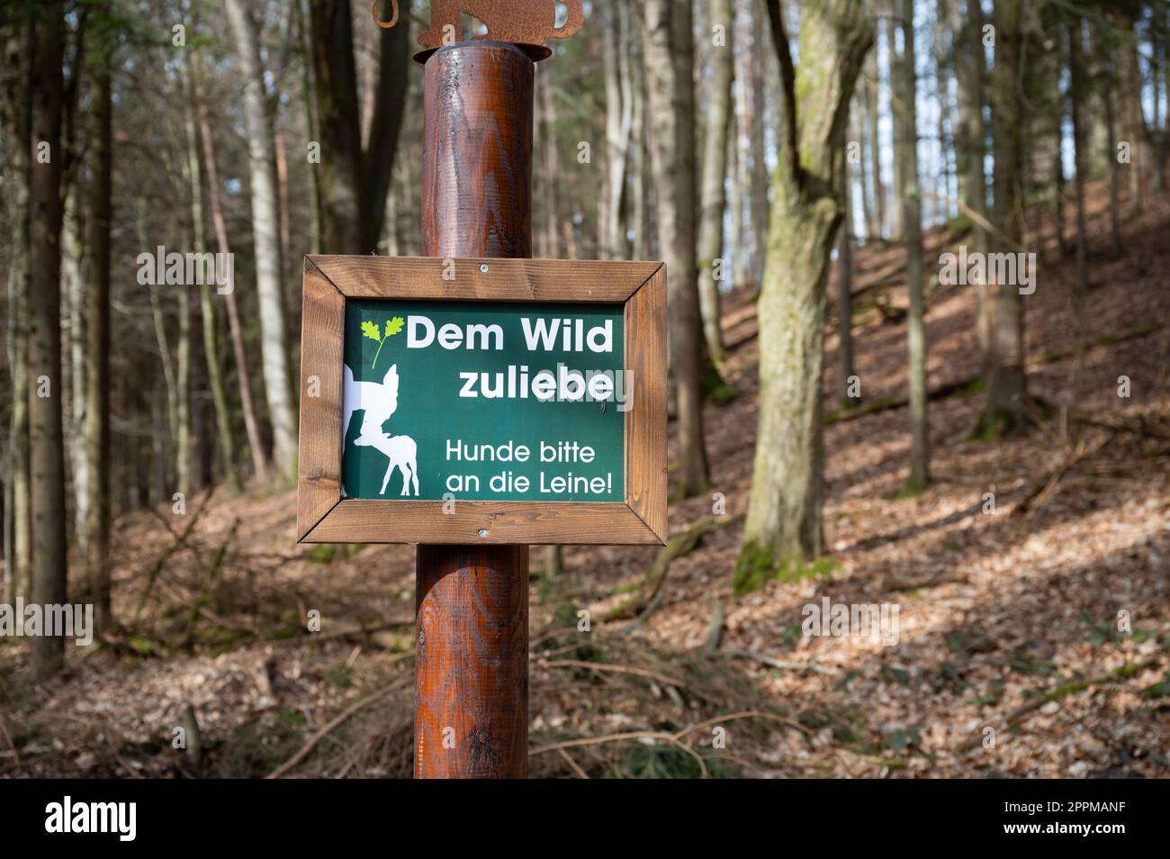 German sign at a wildlife park For the sake of the wild, please keep ...