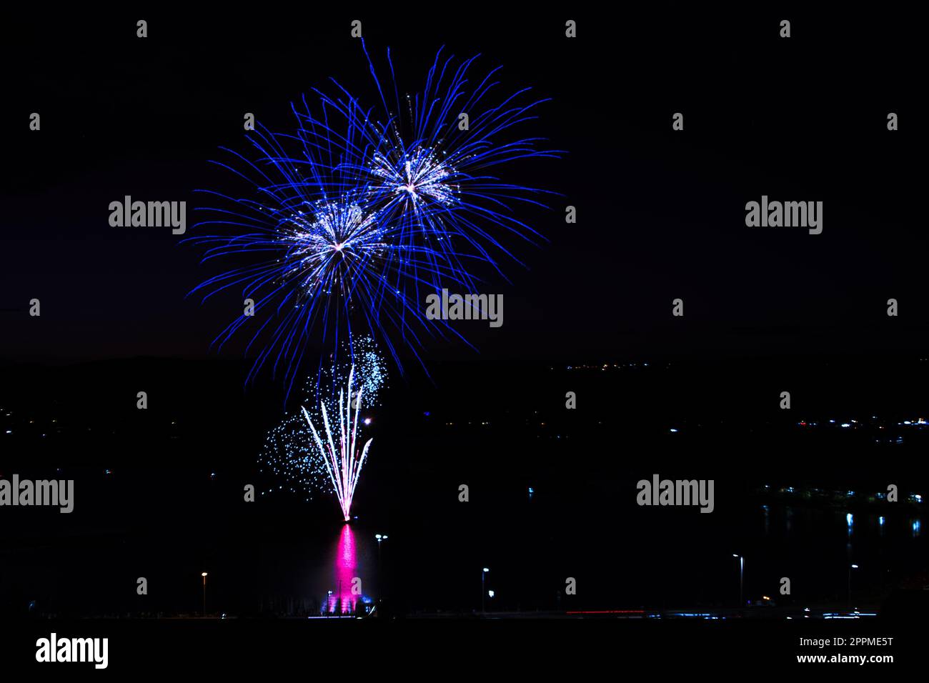 A breathtaking view of a fireworks display over the Brisbane Water in ...
