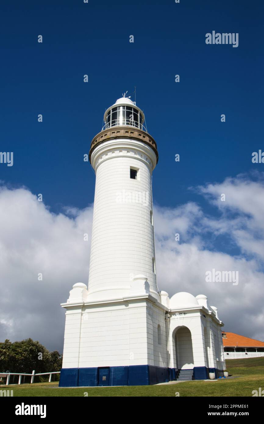 A vertical photograph of the Norah Head lighthouse, with its iconic ...