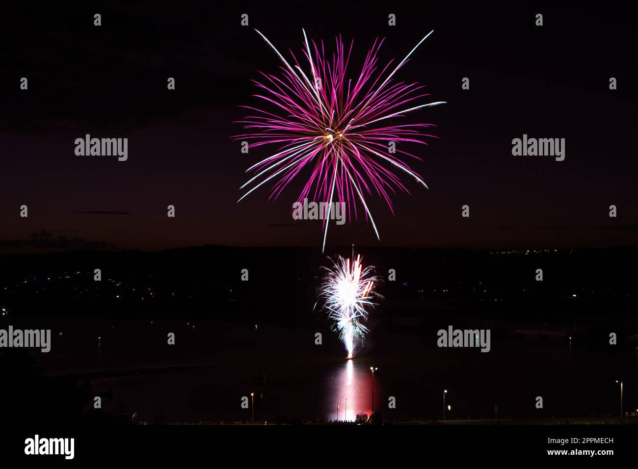 A breathtaking view of a fireworks display over the Brisbane Water in ...