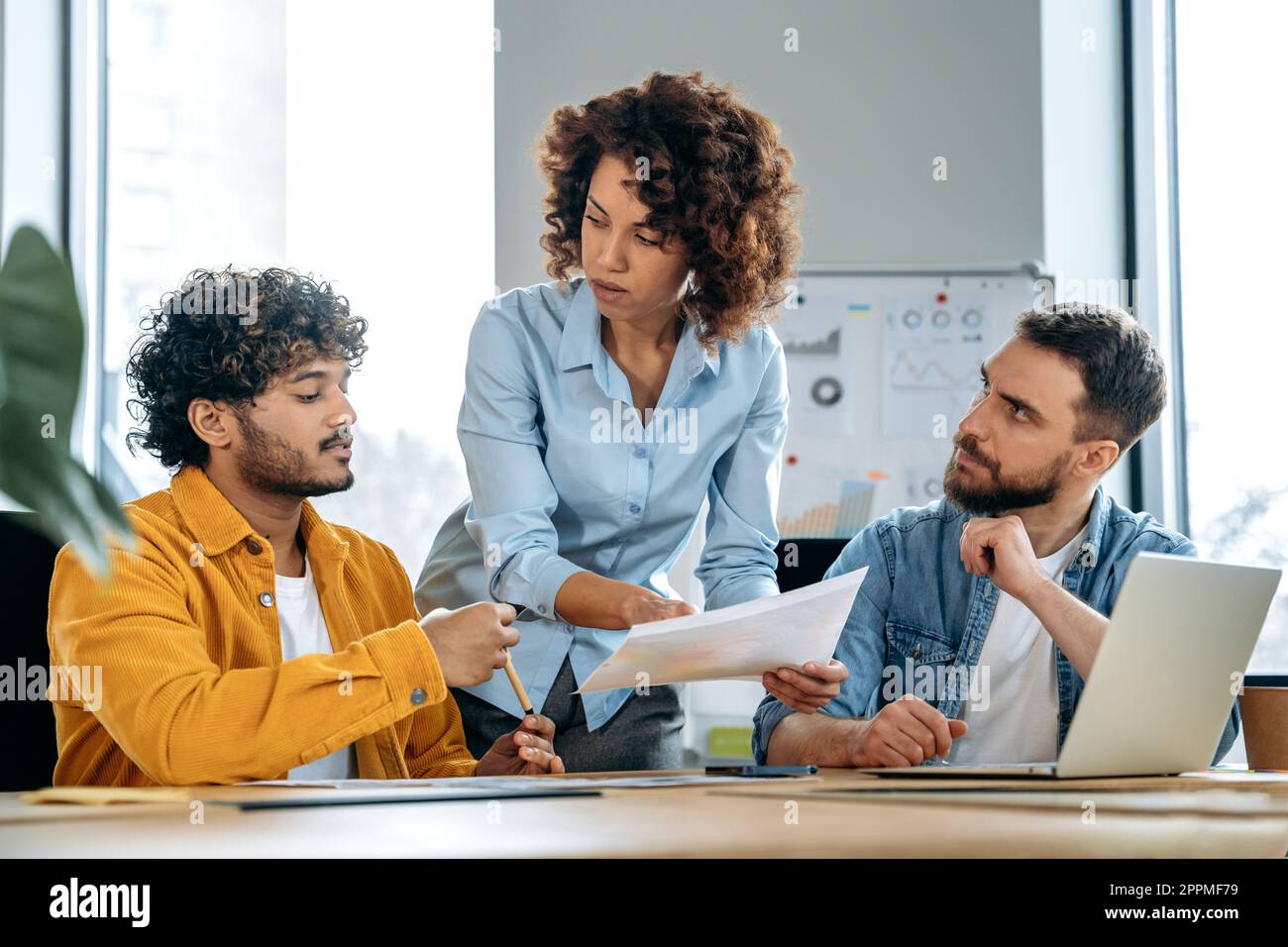 Successful people of different nationalities, creative business team, working together on a ...