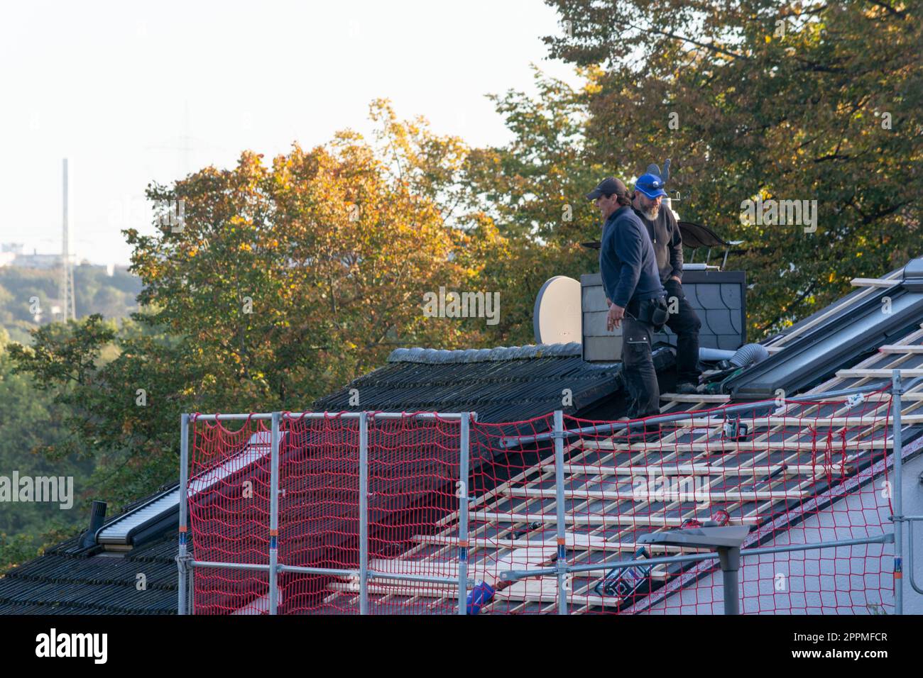 Aerial view of roof work done on a home Stock Photo - Alamy