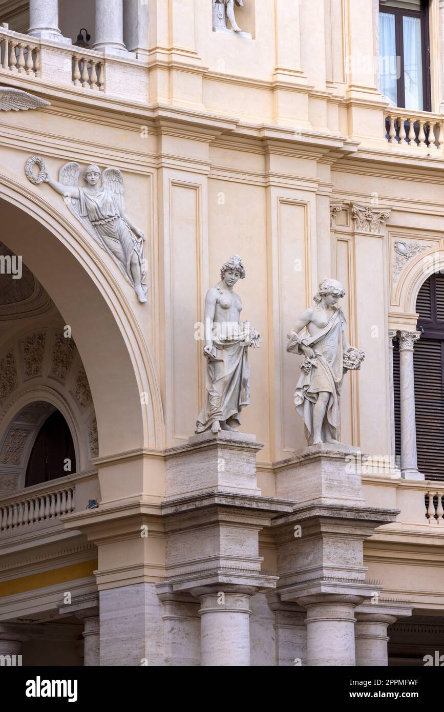 Facade with sculptures of Galleria Umberto I renaissance shopping ...