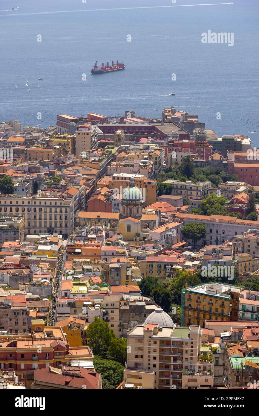 Aerial view of city with colorful buildings and port on Tyrrhenian Sea ...