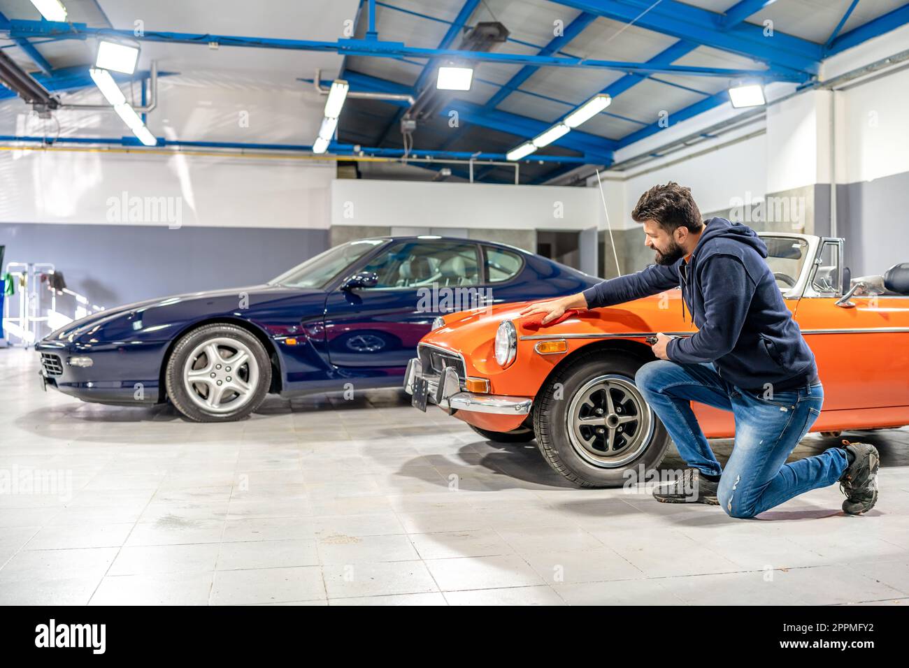 detailing, wash and cleaning of old and new cars in a car studio Stock ...