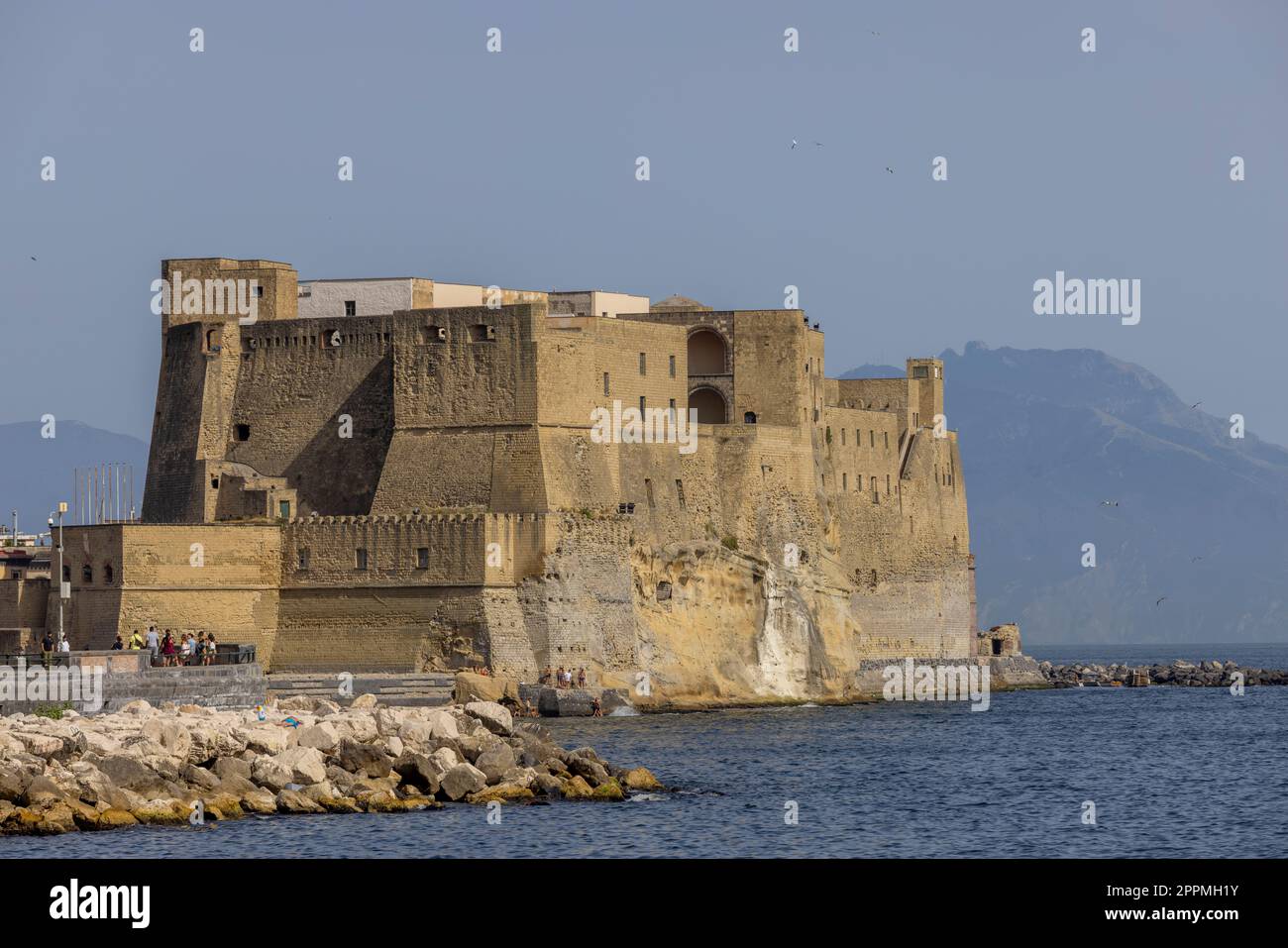 Castel dell'Ovo, medieval castle located on a tiny island off the coast ...