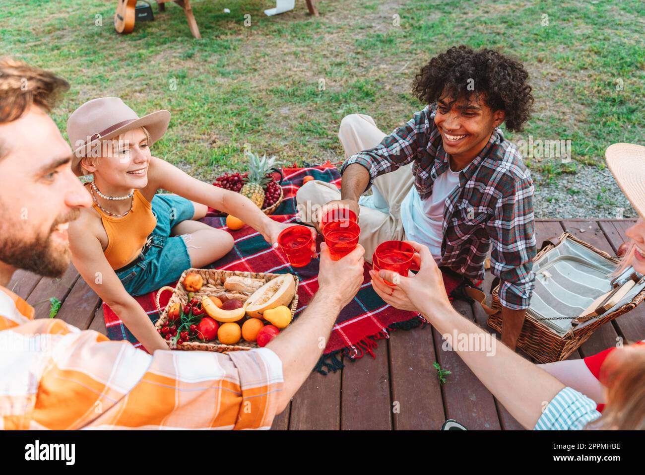 Friends have a picnic outdoor in a sunny day Stock Photo - Alamy