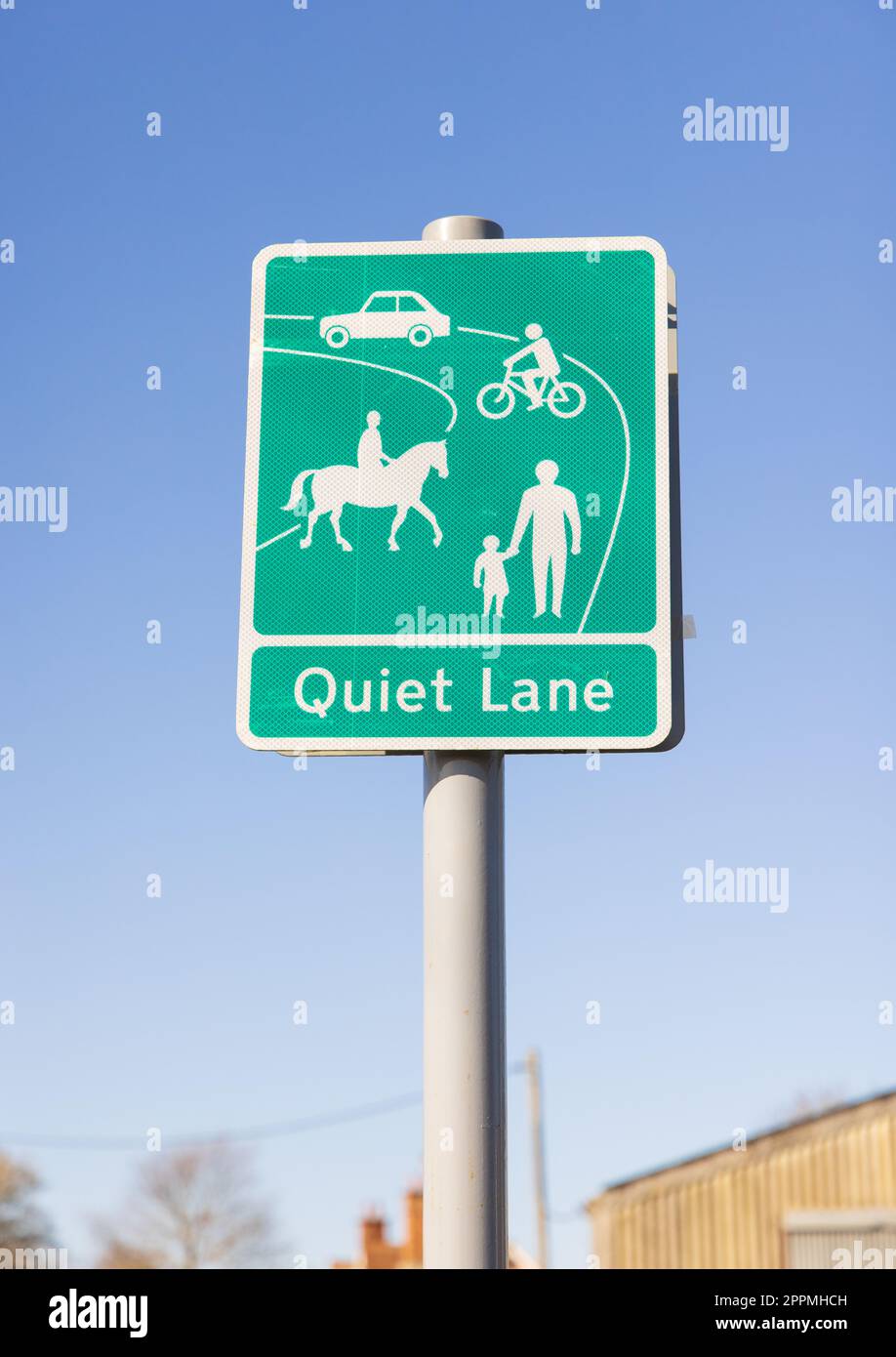 A Quiet Lane sign on single-track road where visitors and locals can ...