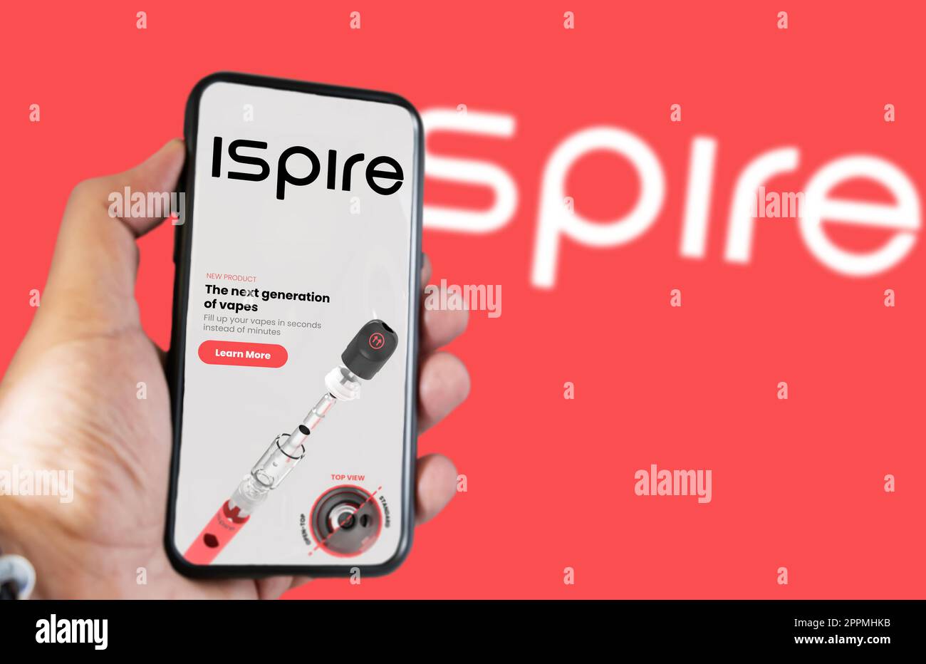 Hand holding a phone with Ispire website on the screen Stock Photo - Alamy