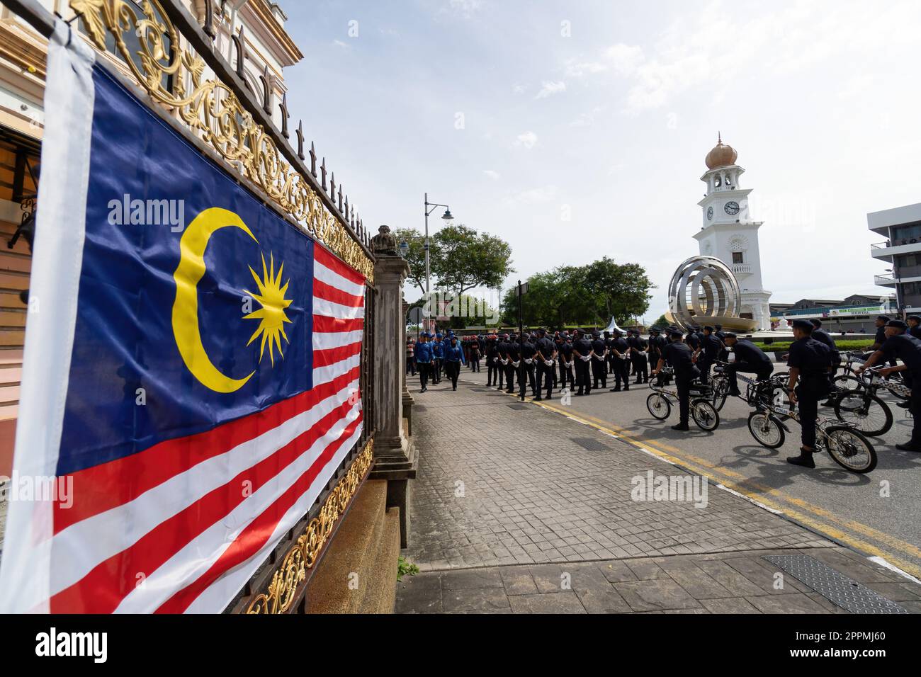 Police cycle during Merdeka Procession near Malaysia flag Stock Photo ...