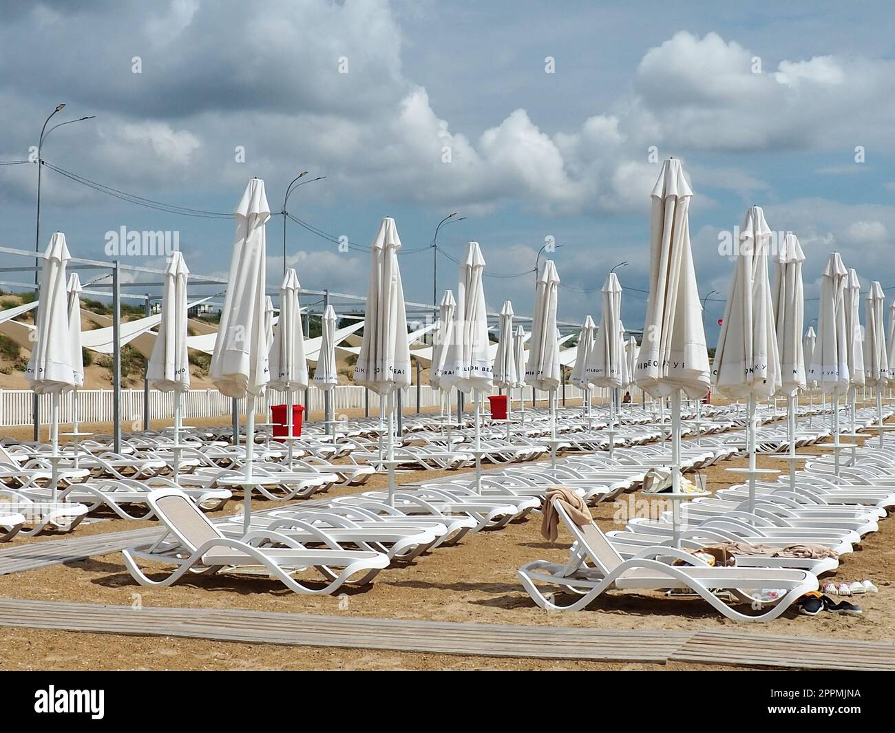 Seaside landscape sand beach sunbeds hi-res stock photography and ...