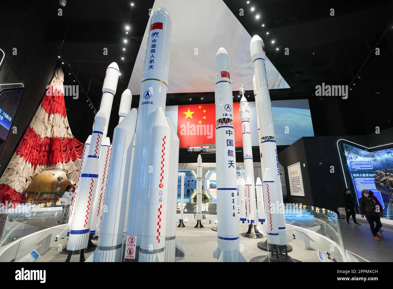 Beijing, China. 24th Apr, 2023. Visitors view models of the Long March ...