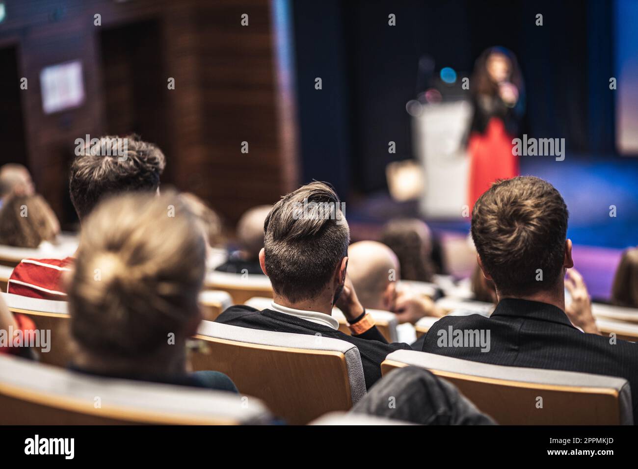 Woman giving presentation on business conference event Stock Photo - Alamy