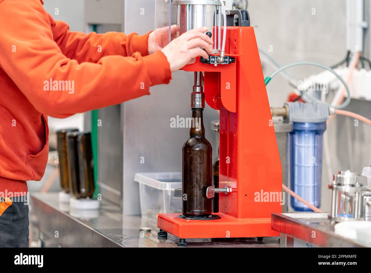 Capping machine hi-res stock photography and images - Alamy