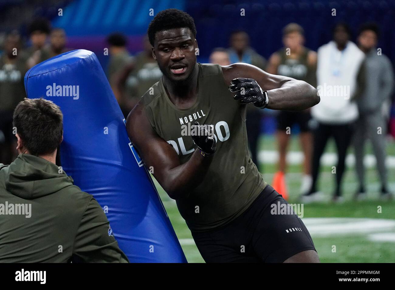 FILE - LSU defensive lineman Ali Gaye runs a drill at the NFL football ...