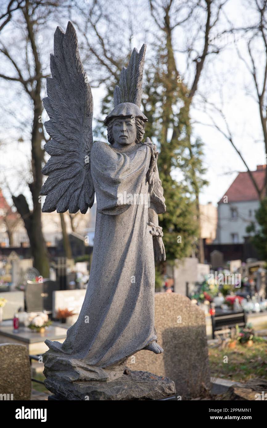 Gray winged angel at the Mater Dolorosa Cemetery in Bytom, Poland Stock ...