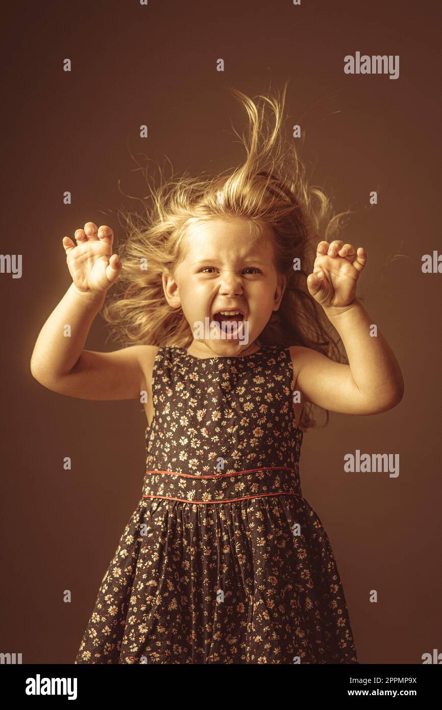 Little girl funny hi-res stock photography and images - Alamy
