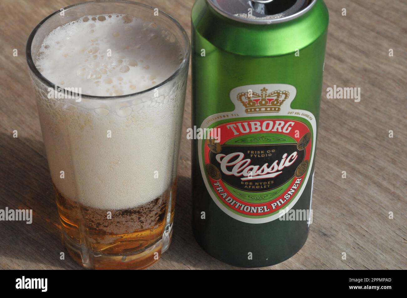 Copenhagen /Denmark/24 April 2023/ Tuborg classic pilsner can and glass ...