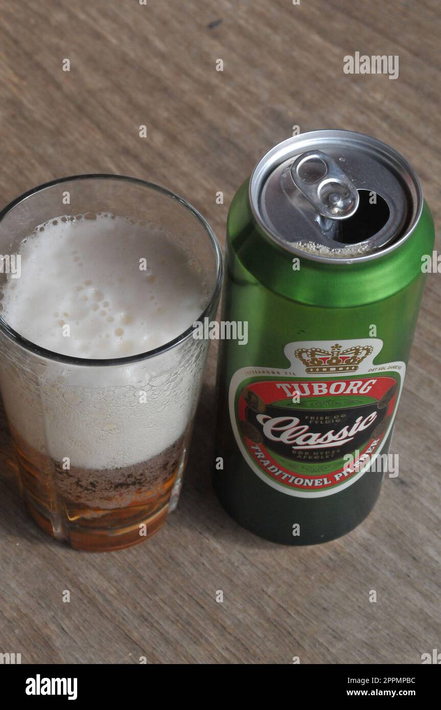 Copenhagen /Denmark/24 April 2023/ Tuborg classic pilsner can and glass ...