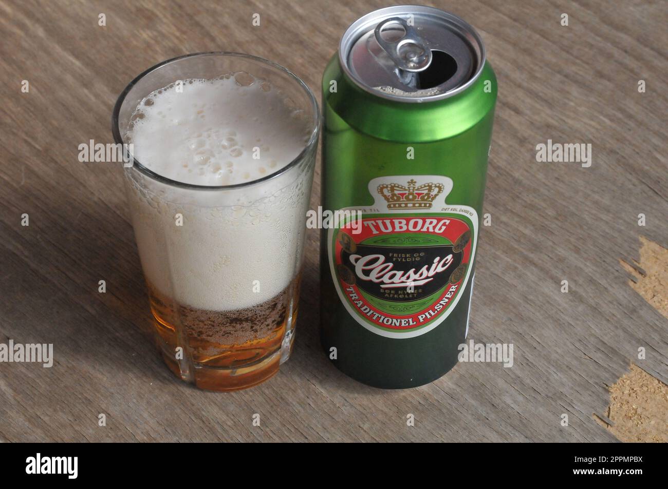 Copenhagen /Denmark/24 April 2023/ Tuborg classic pilsner can and glass ...
