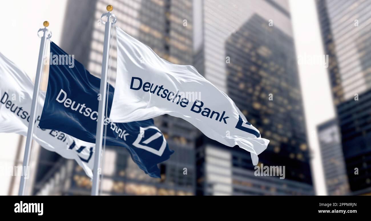 Flags of Deutsche Bank waving in the wind Stock Photo - Alamy