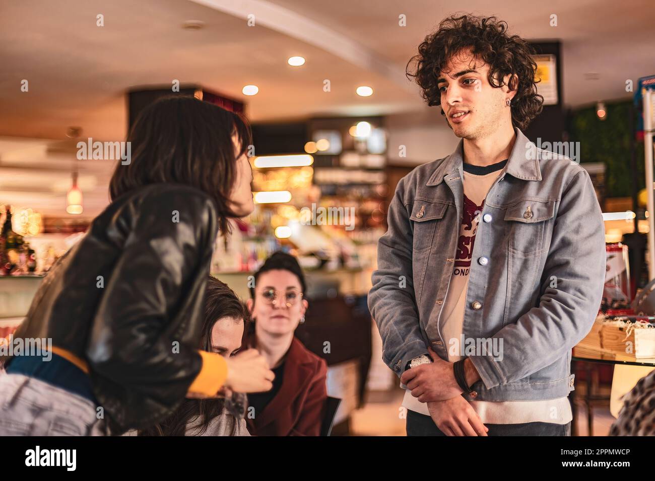 Milan, Italy 24 april 2023: A tense scene as two young women engage in ...