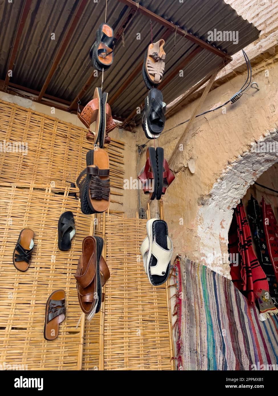 Shoes hanging on a rope Stock Photo - Alamy