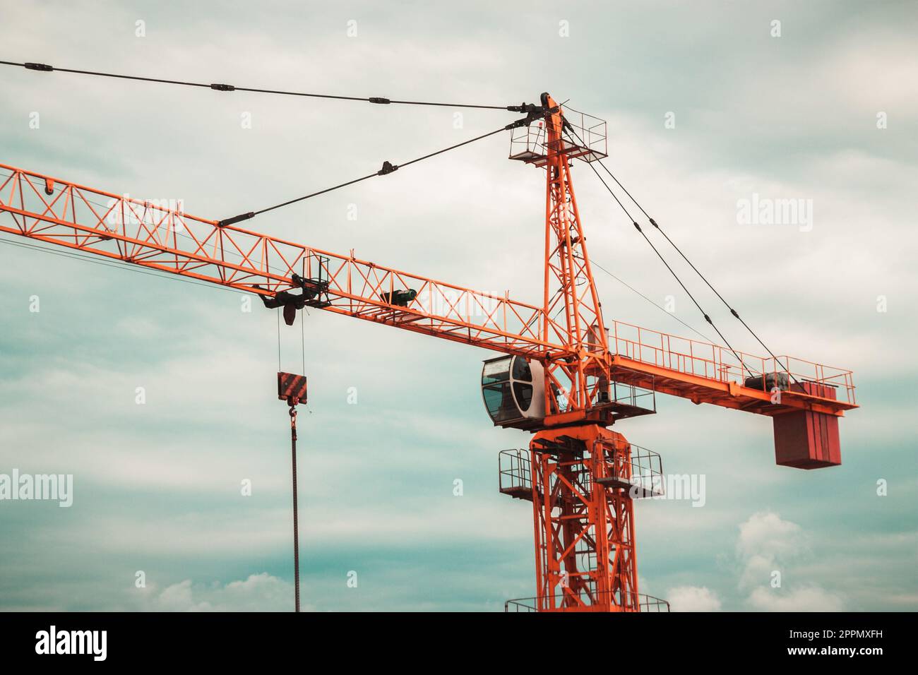 Industrial crane closeup in building site Stock Photo - Alamy