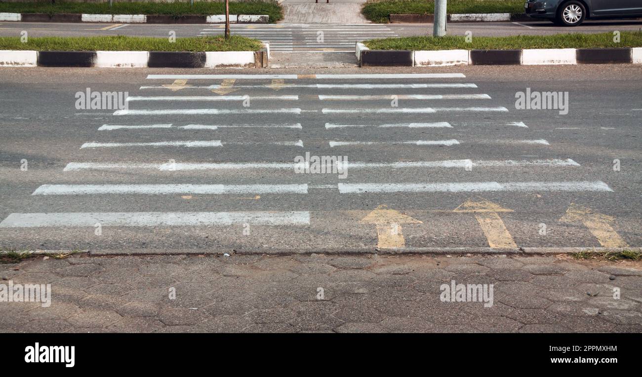 Pedestrian path walk painted on road Stock Photo - Alamy