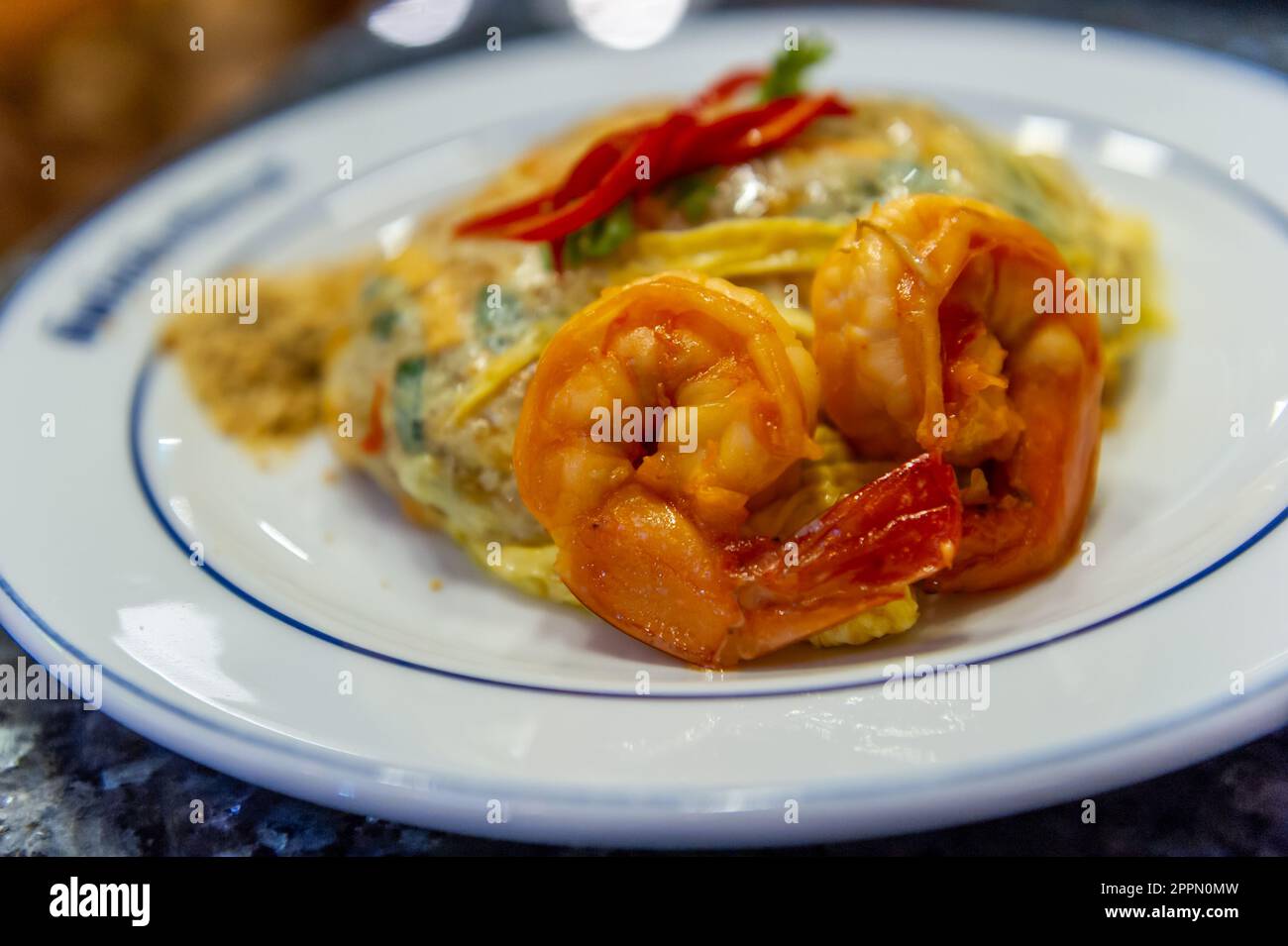Padthai, deep sea prawns wrapped with egg at Thipsamai restaurant ...