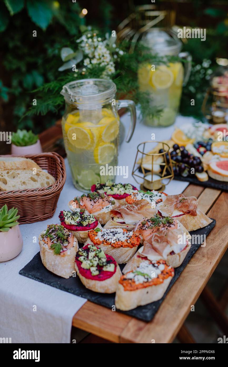 Dessert buffet at small wedding reception outside in the backyard Stock ...