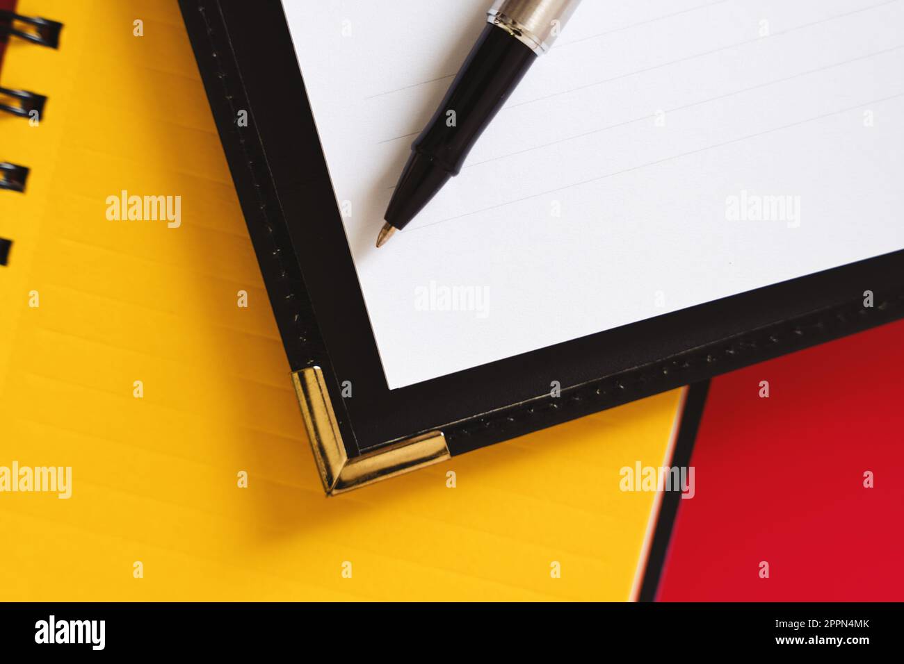 "Personal Planner and Pen on Notebook" - A personal planner and pen on ...