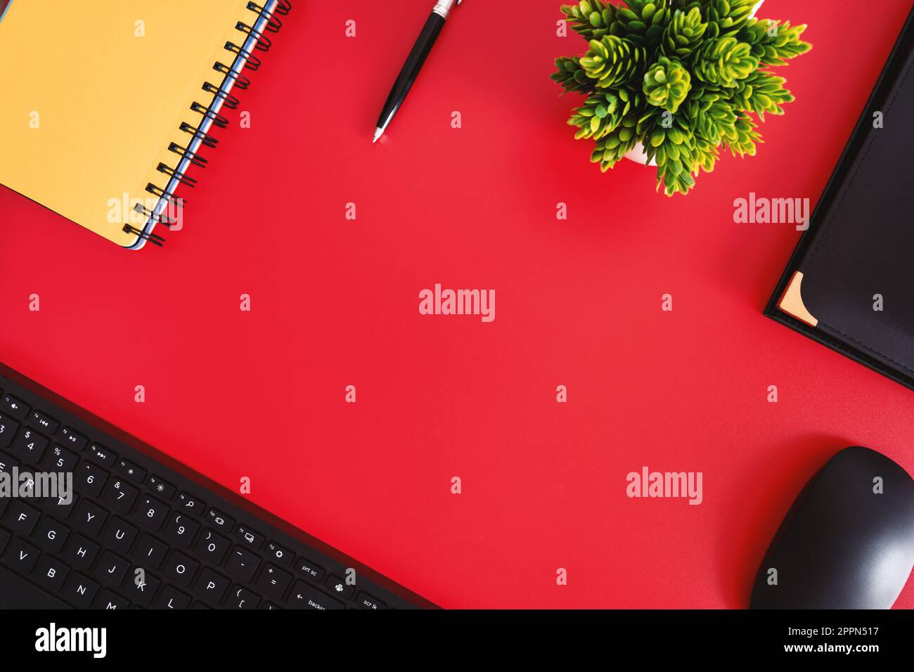 "Red Desk with Essential Tools" - A red flat lay desk with a pen ...