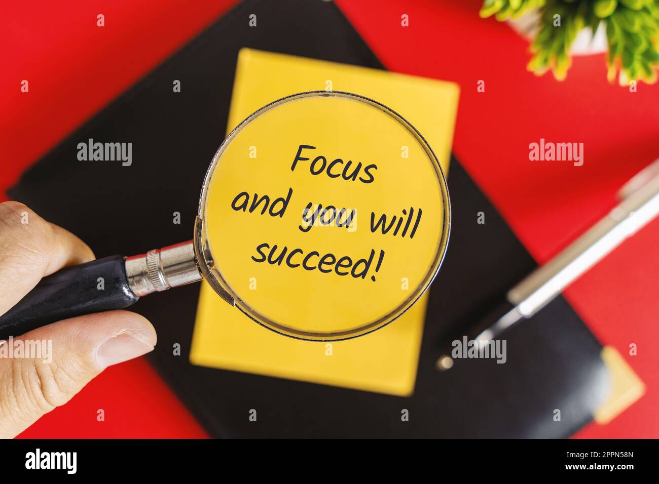 "Magnifying Glass on Life Lesson Quote" - A hand holding a magnifying ...