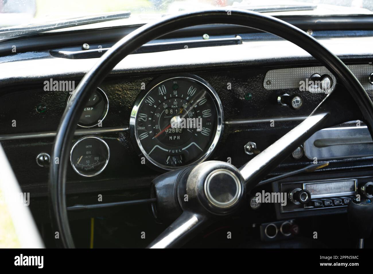 retro car dashboard interior. View of the steering wheel and dashboard ...