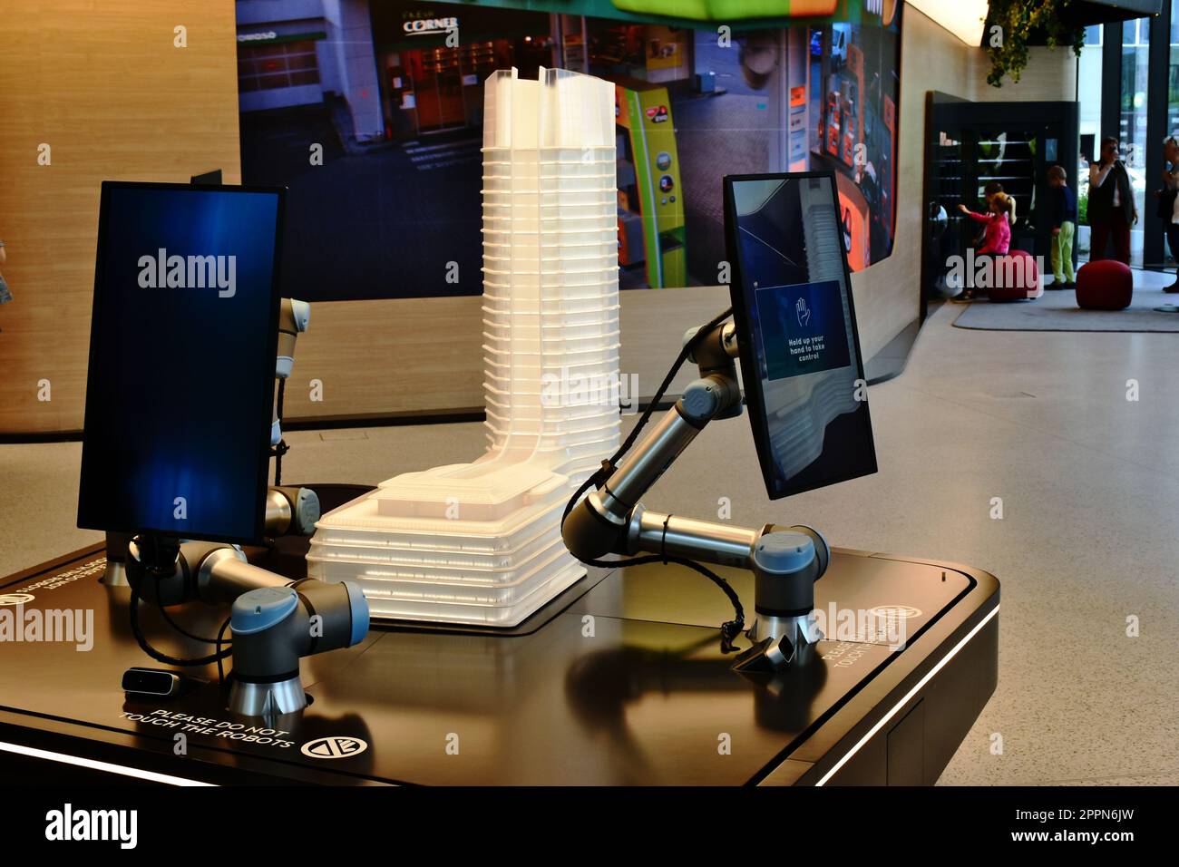 tv monitor robots in the MOL office campus lobby.. elegant interior ...