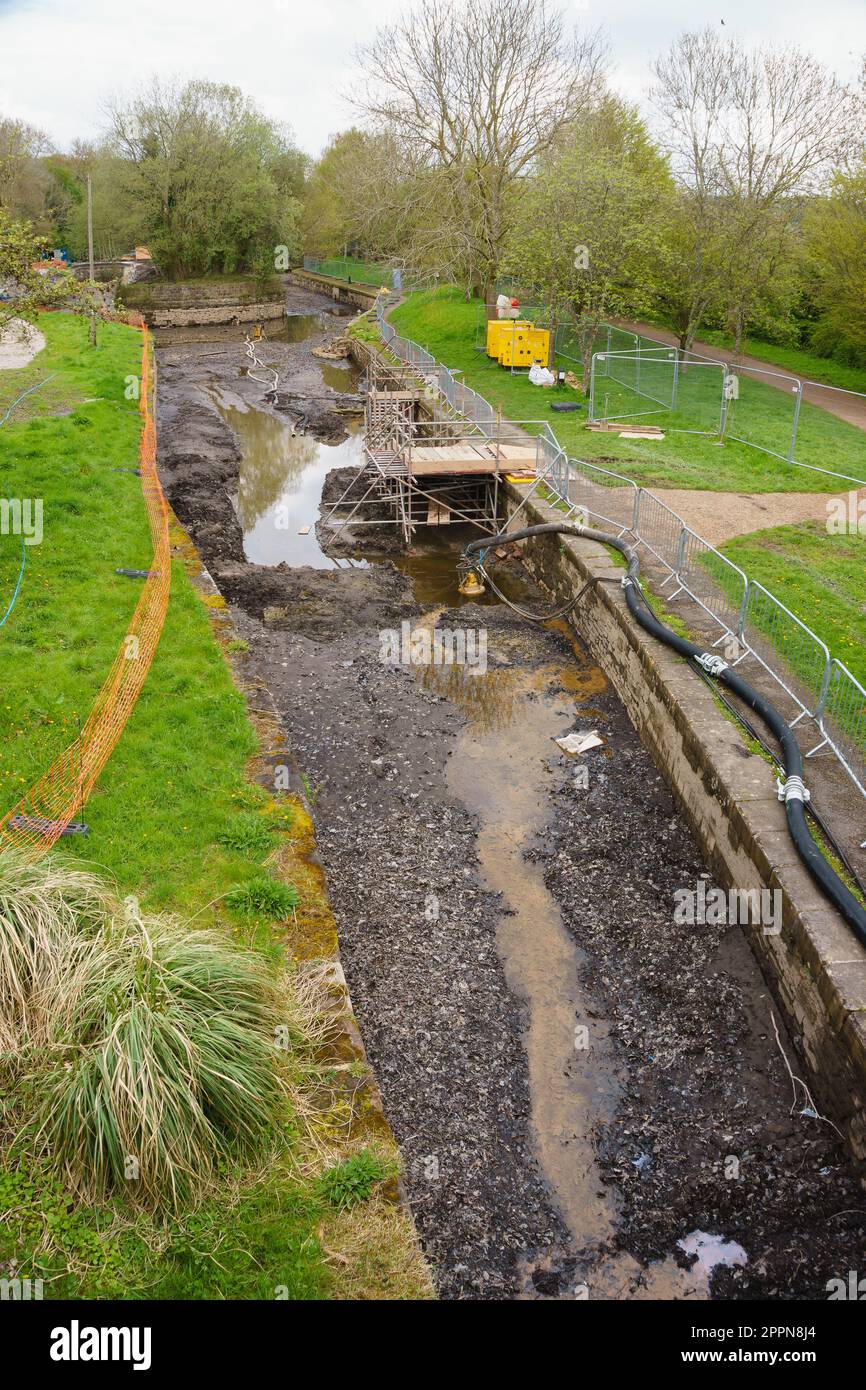 Dredging and repair operations on the drained Llangollen canal in the ...