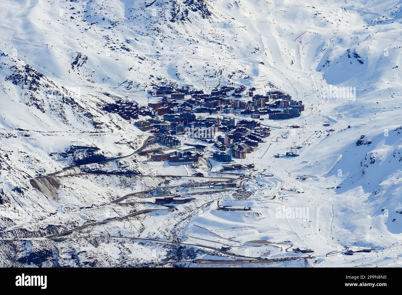 Town of Val Thorens in a snowy valley of the French Alps, as seen from ...