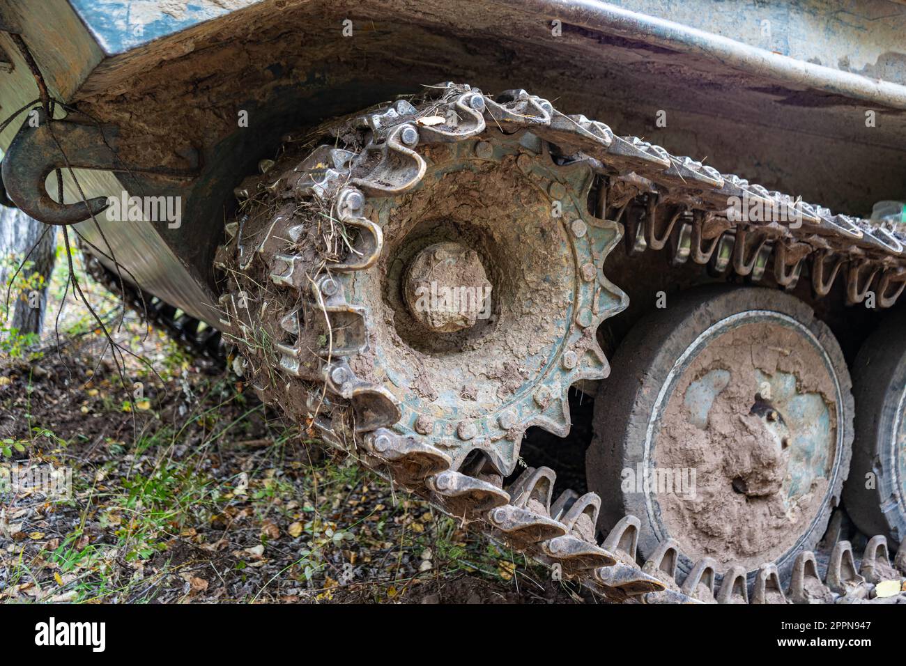 Chassis of tracked military equipment. Metal tracks of a tracked ...